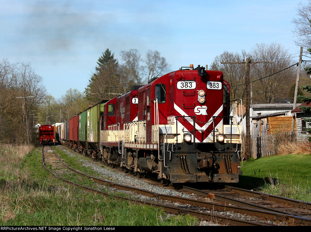 OSR 383 pulls ahead with a cut of hoppers to be dropped off in the siding